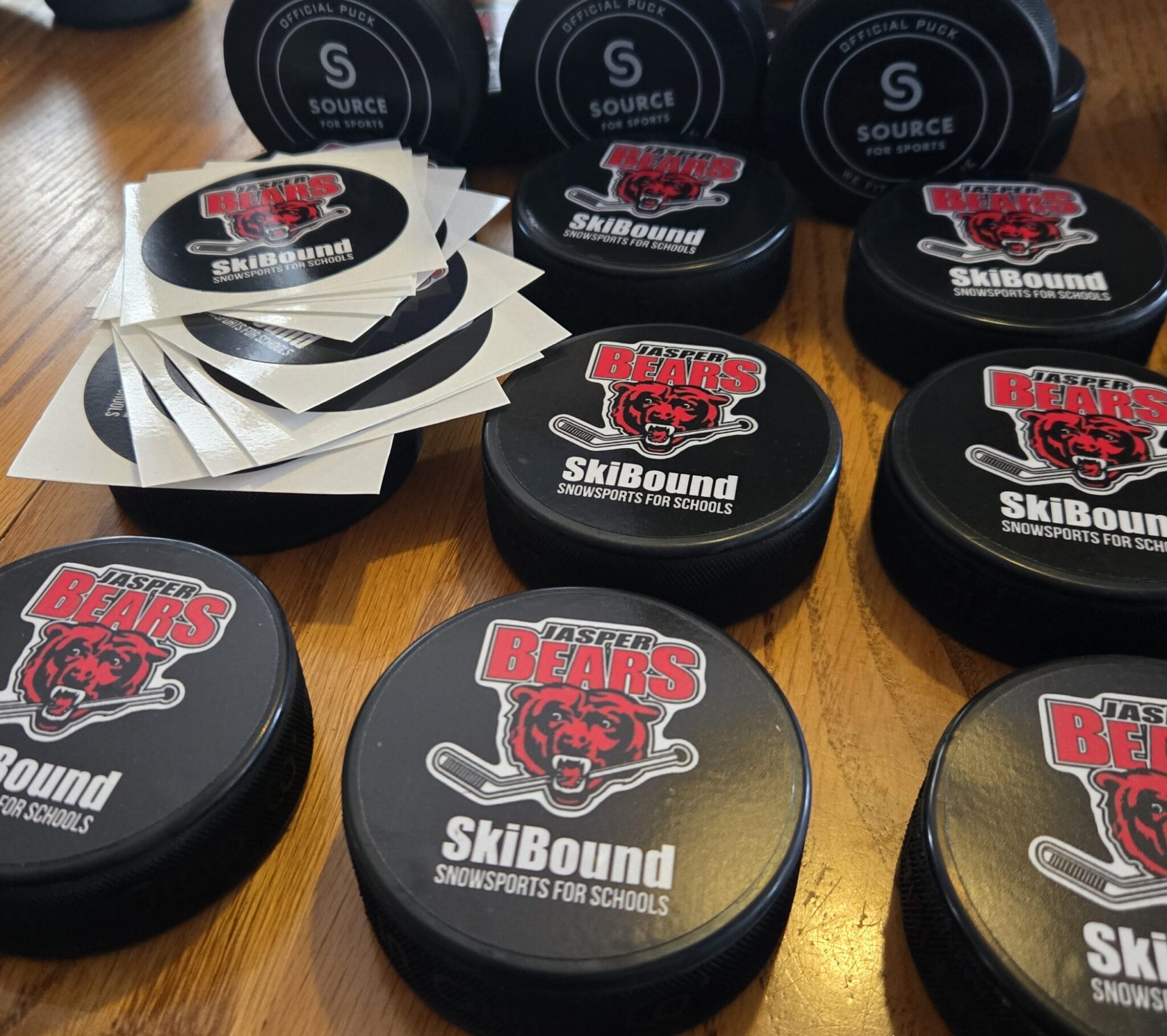 Black ties and hockey pucks: Two donations, one cause - News